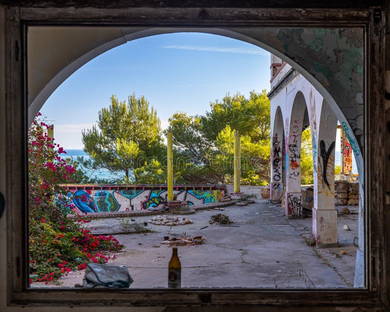 Abandoned Hotel Building on the Beach with Trees Overgrown Editorial ...