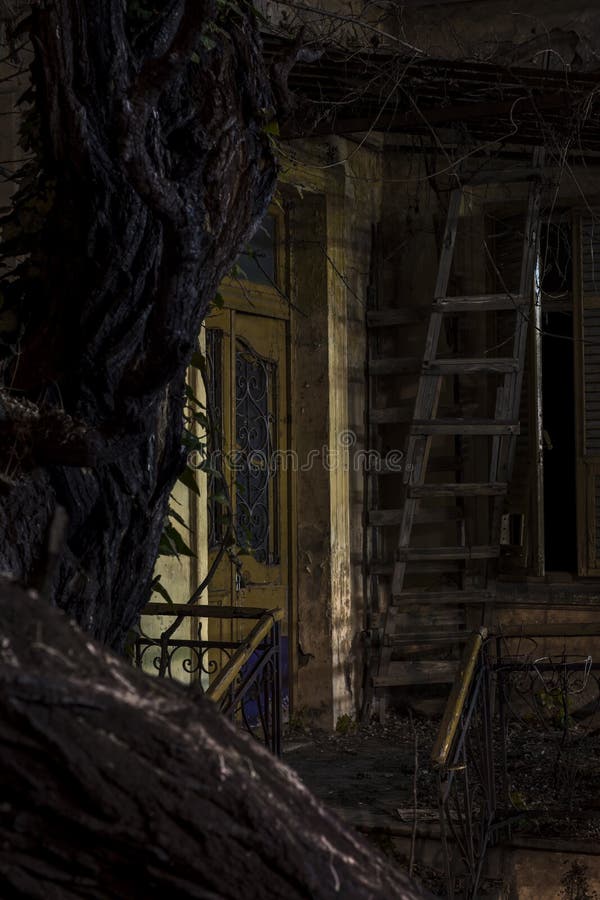 Abandoned house at night stock photo. Image of destruction - 65630362