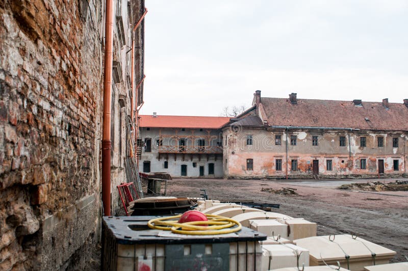 Abandoned Industrial Complex Surrounded by Crumbling Brick Walls and ...