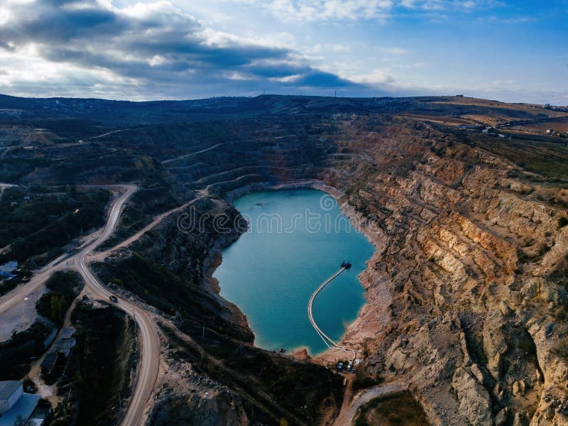 Abandoned Limestone Quarry with Lake at the Bottom Stock Photo - Image ...