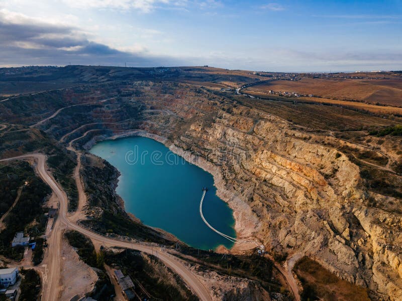 Abandoned Limestone Quarry with Lake at the Bottom Stock Photo - Image ...