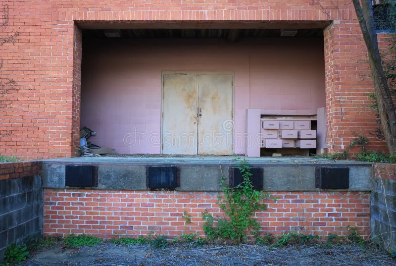 Abandoned Desk Loading Dock Stock Image - Image of door, facade: 273908535