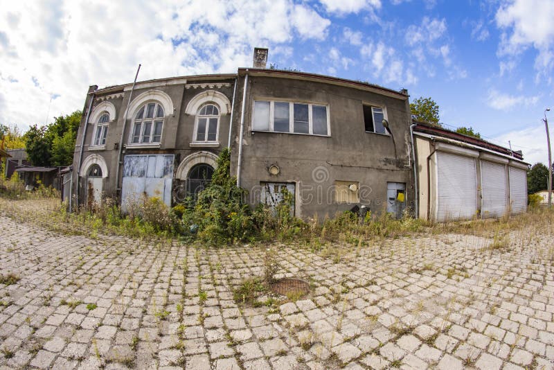 Abandoned and Neglected Building Under a Blue Sky on a Sunny Day ...