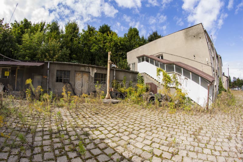 Abandoned and Neglected Building Under a Blue Sky on a Sunny Day ...