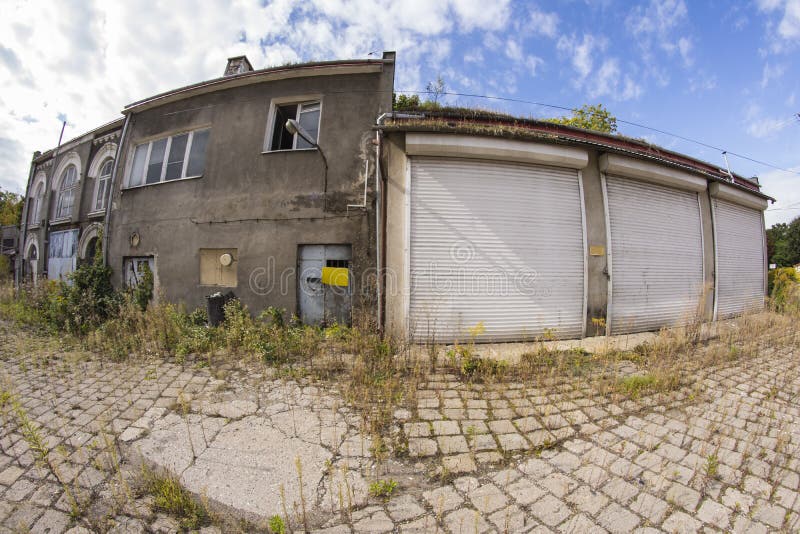 Abandoned and Neglected Building Under a Blue Sky on a Sunny Day ...