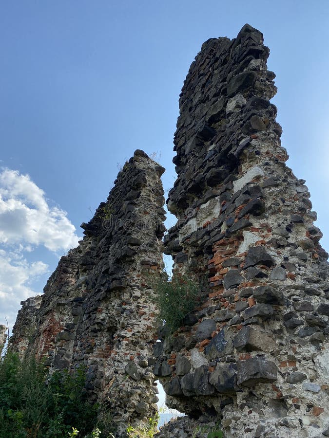 An Abandoned Old Building with Peeling Paint and Cracked Windows. the ...