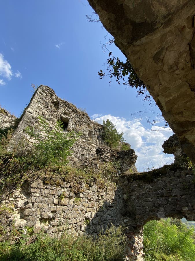 An Abandoned Old Building with Peeling Paint and Cracked Windows. the ...
