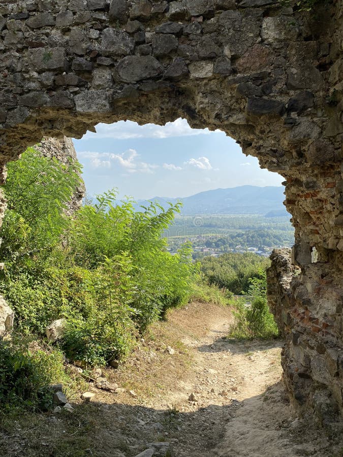 An Abandoned Old Building with Peeling Paint and Cracked Windows. the ...
