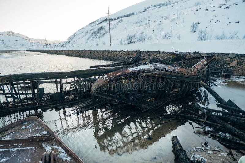 Abandoned Old Rusty Ship in the North. Graveyard of Ships at Sea Stock ...