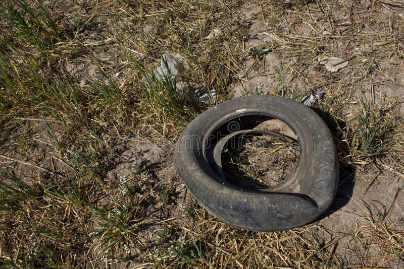 Abandoned Old Tire in a Empty Lote Stock Image - Image of tyre ...