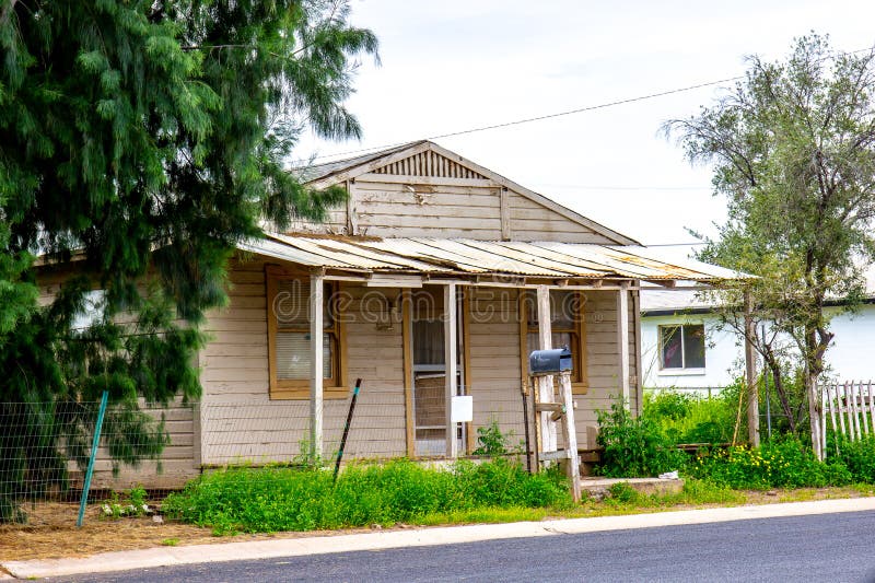 Abandoned Home with Overgrown Weeds Stock Photo - Image of story, weeds ...