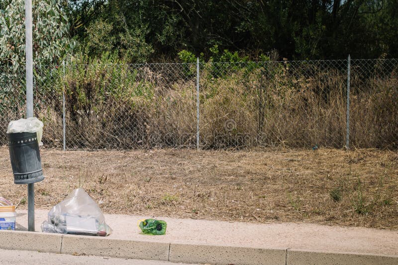Abandoned Plastic Bags of Garbage on the Road.Environmental Pollution ...