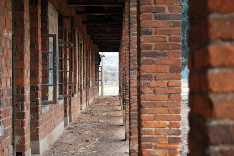 Abandoned Primary School with Brick Corridor and Open Windows Stock ...