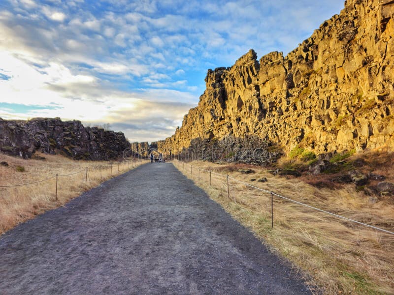 Abandoned Road with Scattered Rocks and Overgrown Grass at Its ...