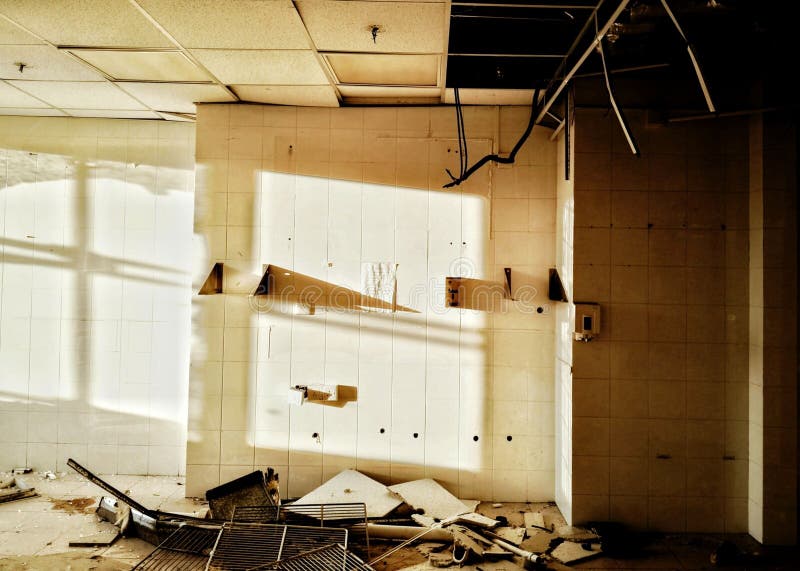 Abandoned Room with a Cracked Floor and Wall Mirror Stock Photo - Image ...