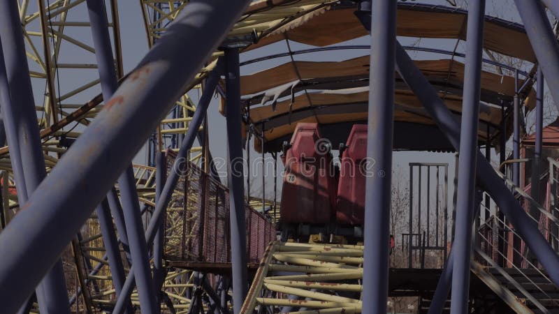 An Abandoned, Rust-covered Roller Coaster Ride in an Abandoned ...
