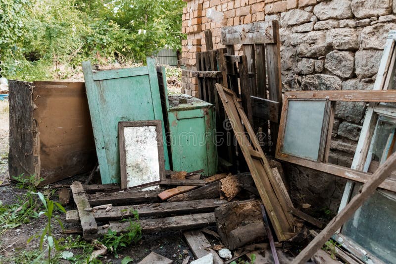 Abandoned Rustic Objects in an Overgrown Outdoor Setting Stock Photo ...