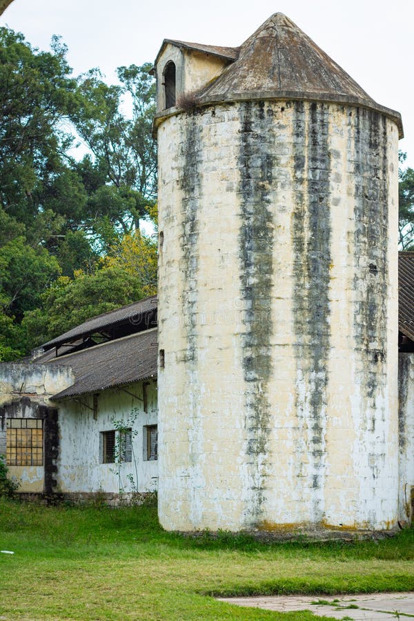 Abandoned Rusticity: Corn Silo and Unused Warehouse Stock Image - Image ...