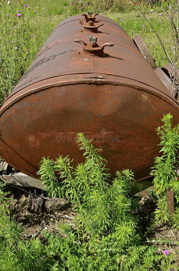 Abandoned rusty oil tank stock image. Image of fuel, metal - 83359385