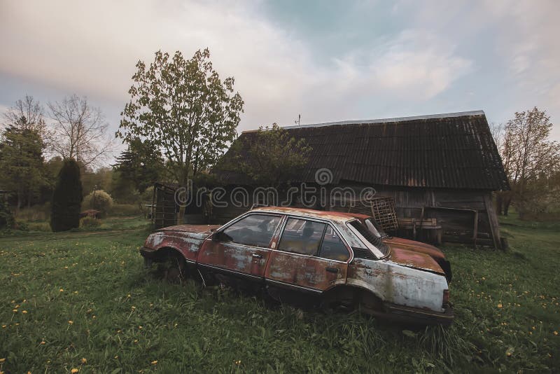 Abandoned Rusty Soviet Car on Rural Backyard with Wooden Buildings ...