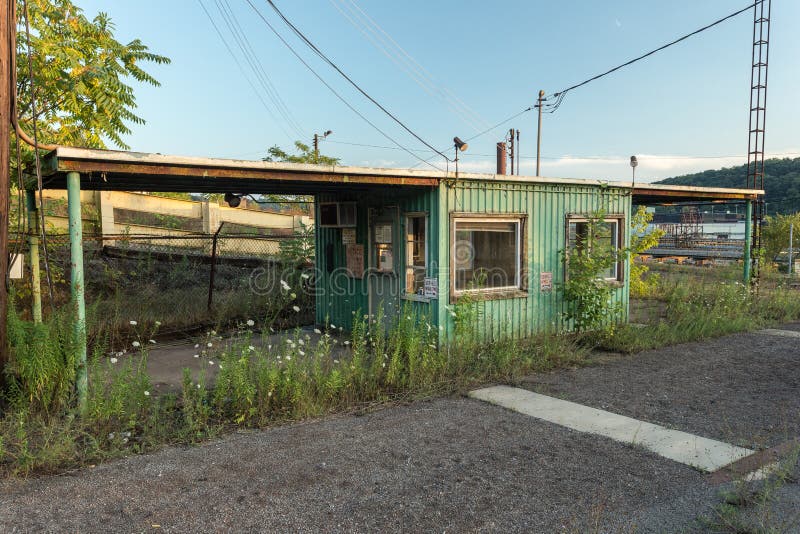 Abandoned Old Security Guard Building with Cracked Wooden Doors and ...