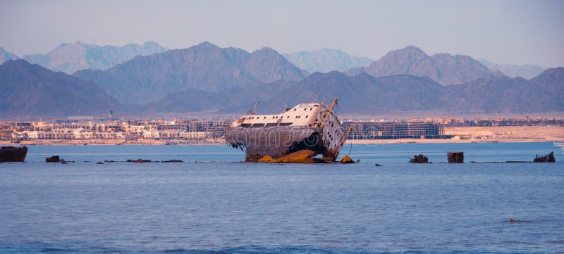 Abandoned ship in the sea stock photo. Image of ship - 90455358