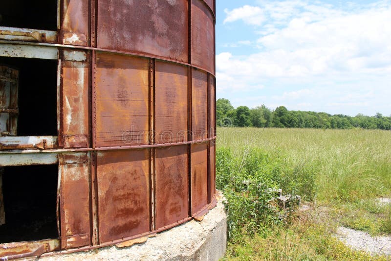 Abandoned Silo Next To Overgrown Field Stock Photo - Image of rusty ...