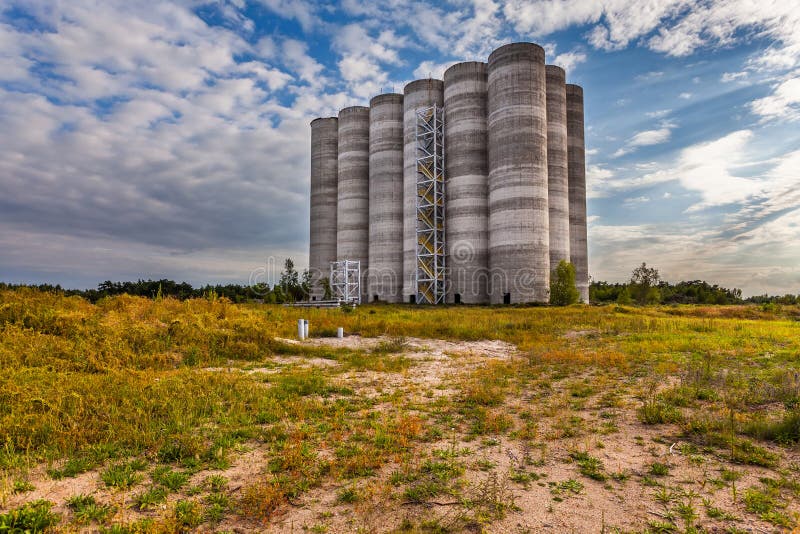 Abandoned Old Concrete Silos Stock Image - Image of blue, business ...