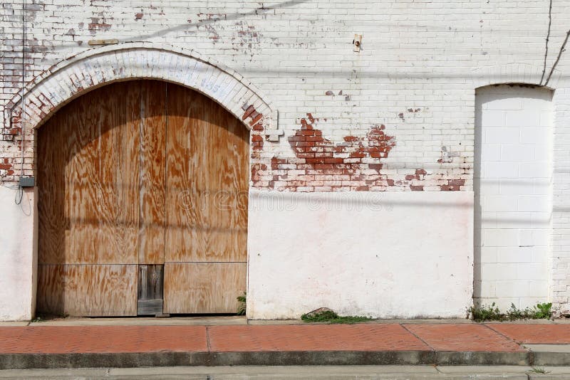 Abandoned Warehouse Building Boarded Up Loading Dock Bay Door Stock ...