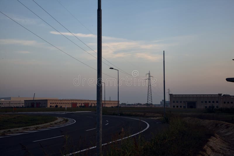 Abandoned Warehouses and Pylons Next To a Roundabout in an Industrial ...