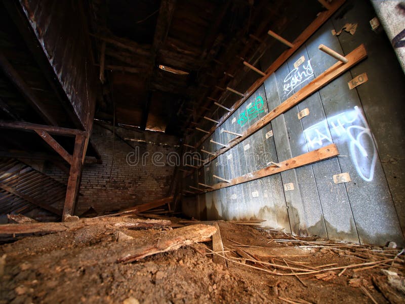 Abandoned Wooden Beams Inside a Decaying Structure with Graffiti and ...