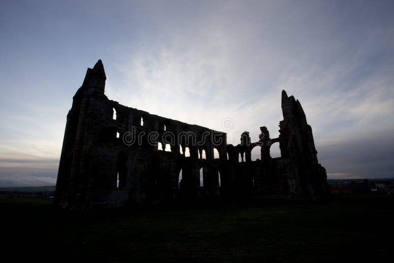 Silhouette of Whitby Abbey with Moody Sky Stock Photo - Image of ...