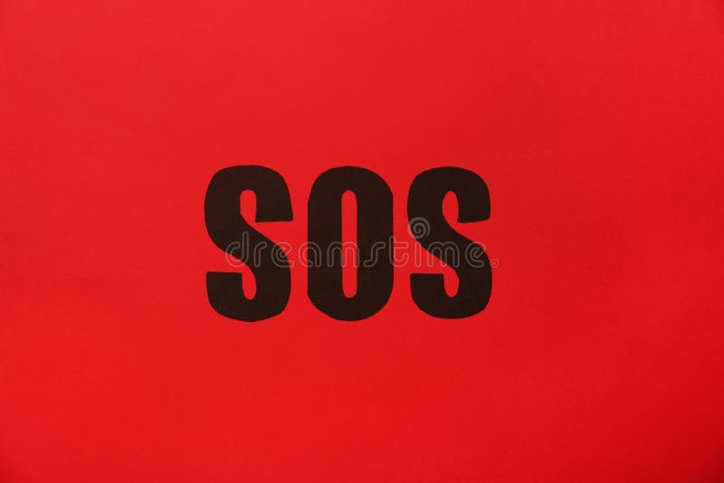 Abbreviation SOS Save Our Souls Written on Red Background, Top View ...