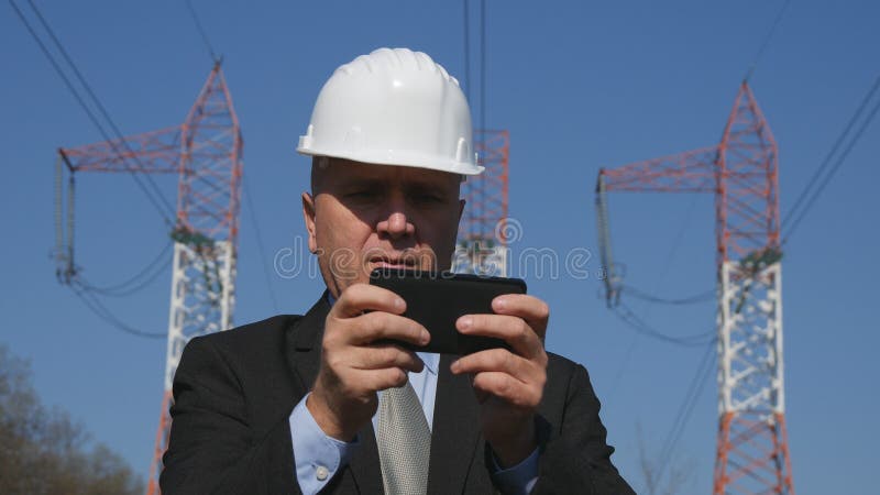 Energy Industry Engineer Use Cell Phone Working in Maintenance Activity ...