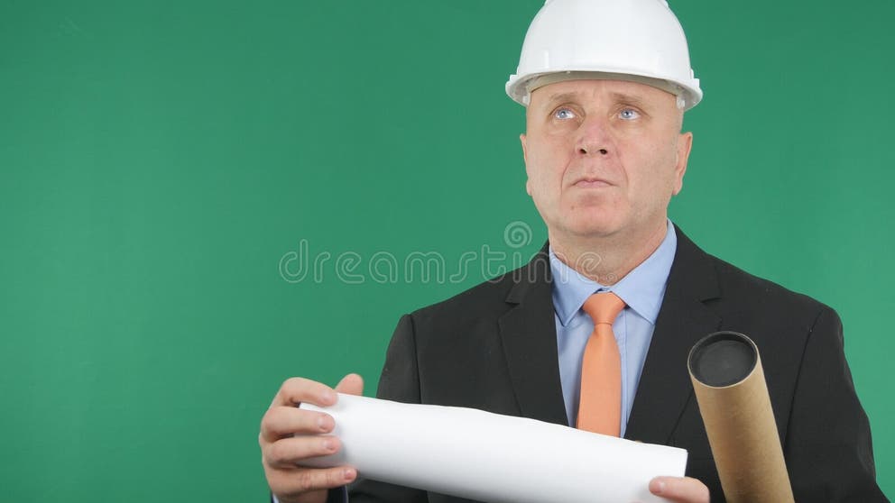 Engineer with Plans in Hands Looking Forward Stock Image - Image of ...