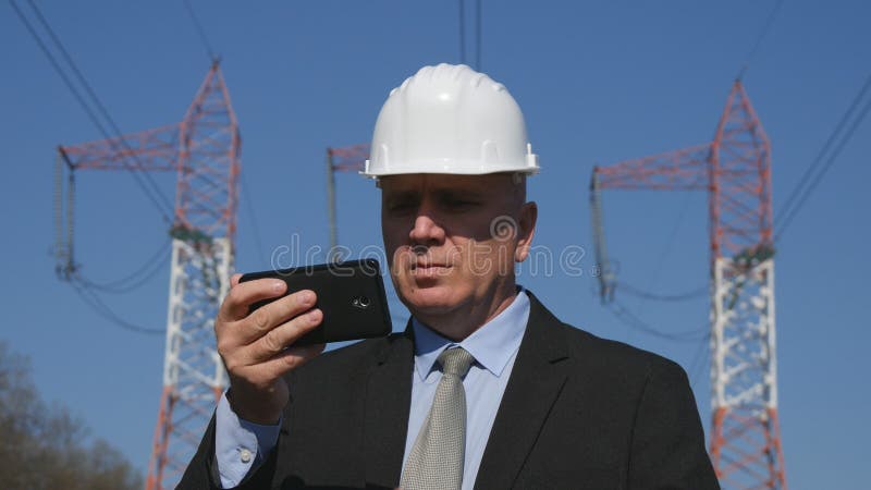 Engineer Using Cell Phone in Maintenance Activity Stock Photo - Image ...