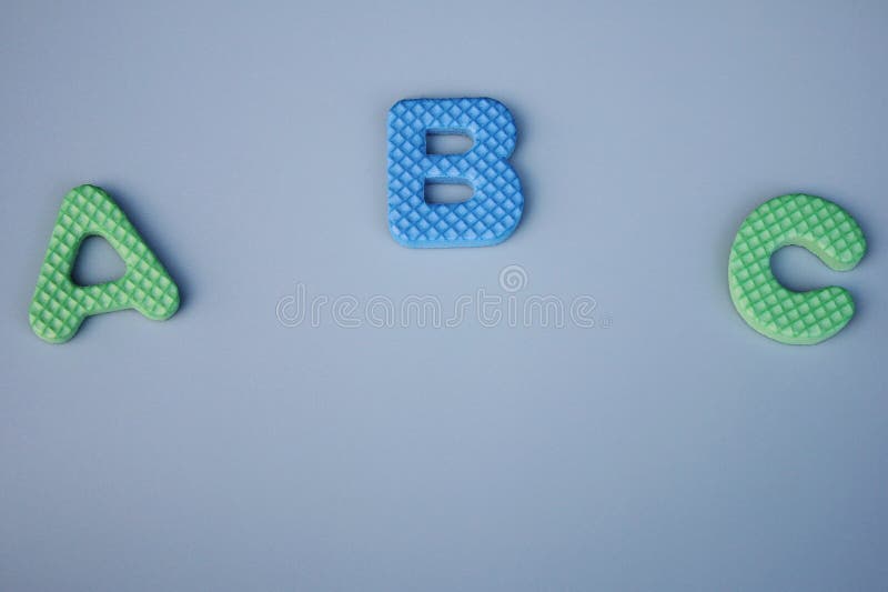 ABC - the First Letters of the English Alphabet on a Blue Background ...