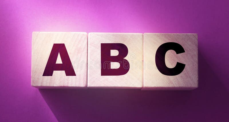 ABC Letters Wooden Blocks on Purple. Education Concept Stock Image ...