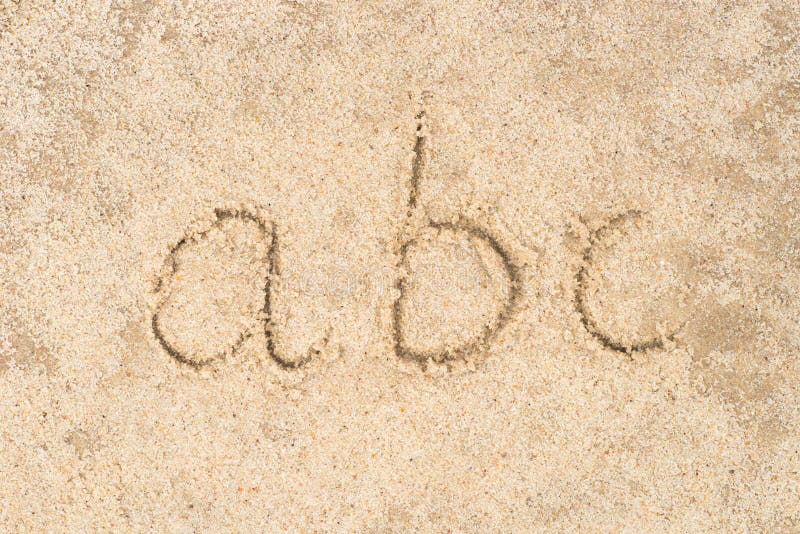 Alphabet Letters Handwritten In Sand On Beach Stock Photo - Image of ...
