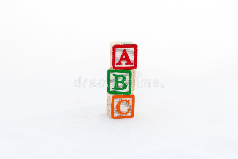 ABC Wooden Blocks Stacked Vertically Isolated on White Background Stock ...