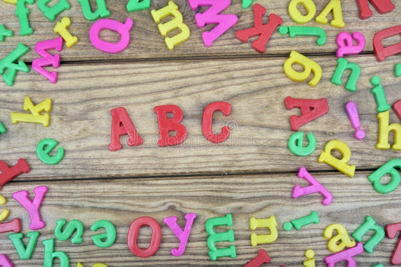 ABC on wooden table stock photo. Image of kids, frame - 74527694