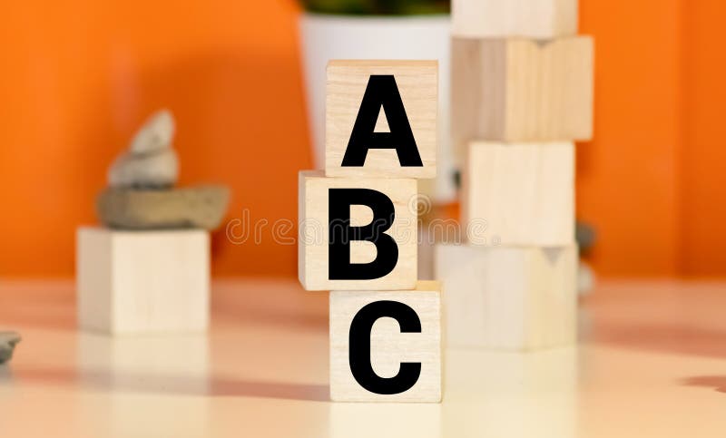 ABC words on wooden blocks stock photo. Image of learn - 211614060