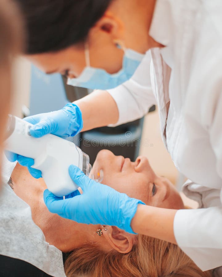 The Ablative Laser Removes the Thin Outer Layer of the Skin Stock Photo ...