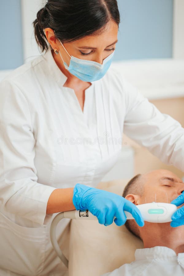 The Ablative Laser Removes the Thin Outer Layer of the Skin Stock Photo ...