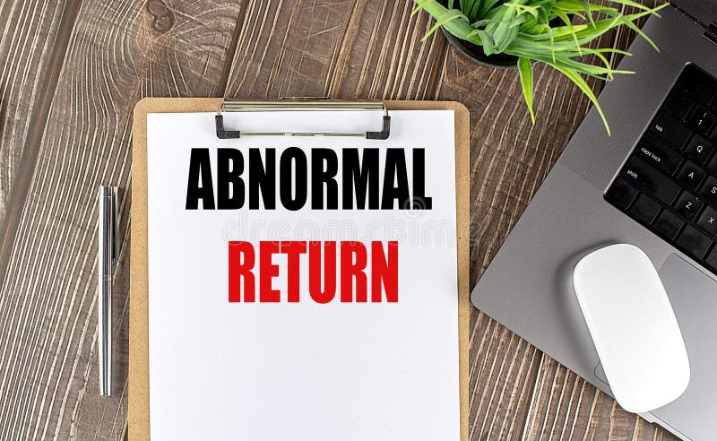 ABNORMAL RETURN Text on Clipboard Paper with Laptop, Mouse and Pen ...
