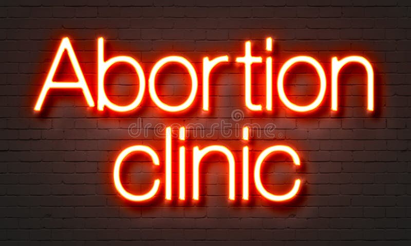 Abortion Clinic Neon Sign on Brick Wall Background. Stock Image - Image ...