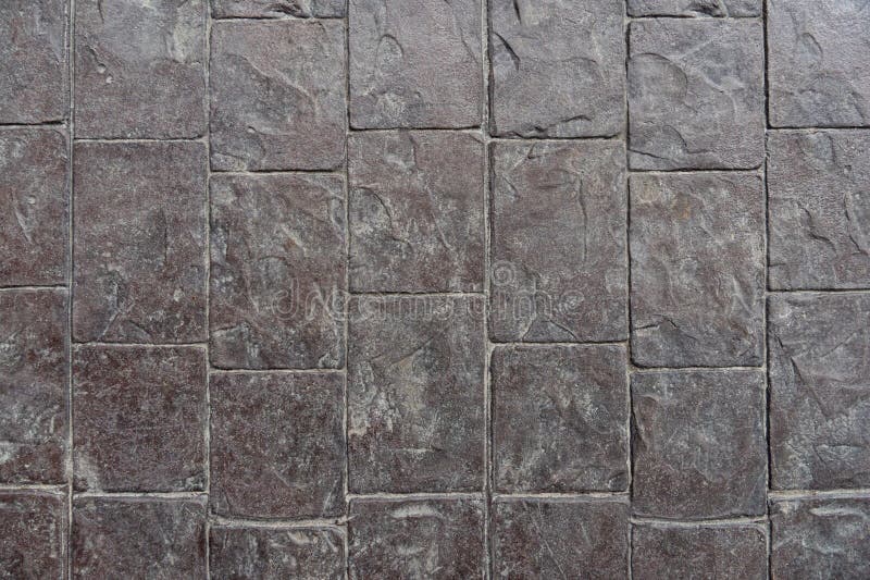 Above of Cement Floor with Lines Cut on the Floor are a Brick Pattern ...