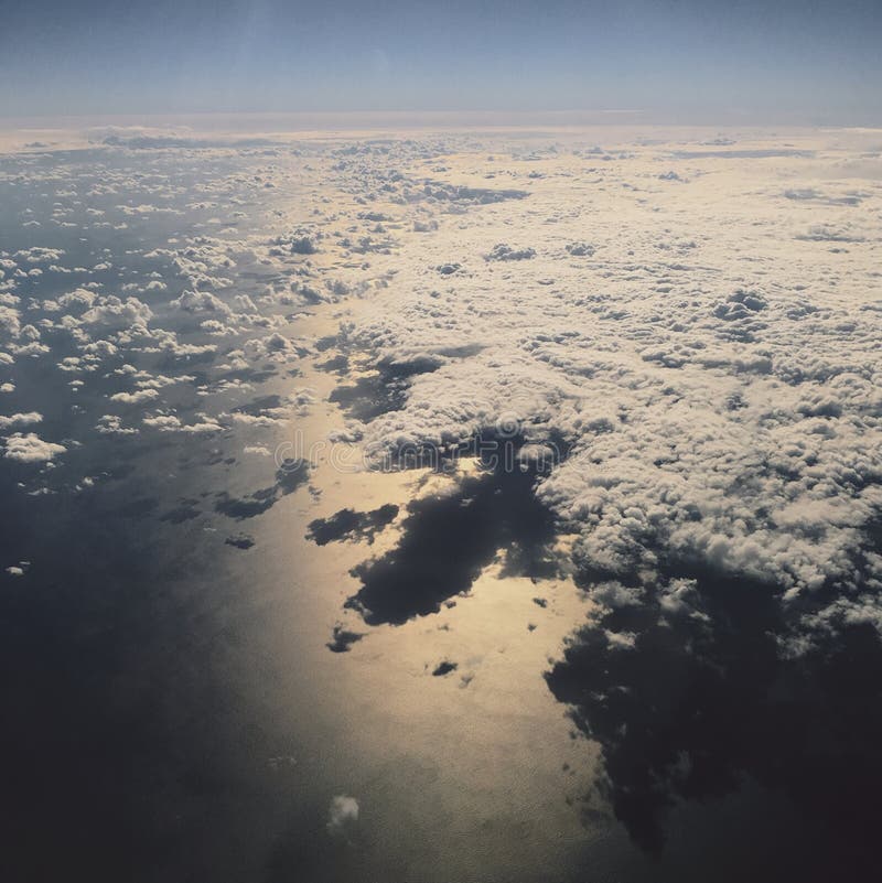 Above the clouds stock photo. Image of golden, ocean - 142014598