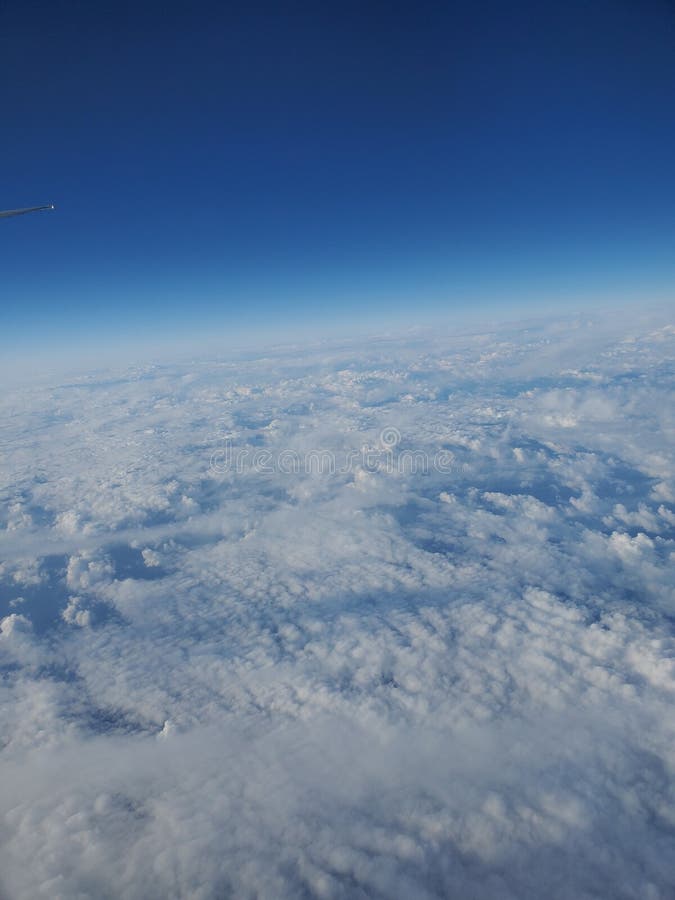 Above the Clouds - View from the Plane 1 Stock Image - Image of plane ...
