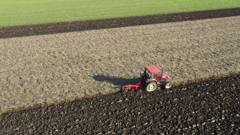 Above Dolly Move of Tractor As Dragging Plow To Plows Agricultural ... Above Dolly Move of Tractor As Dragging Plow To Plows Agricultural ...
